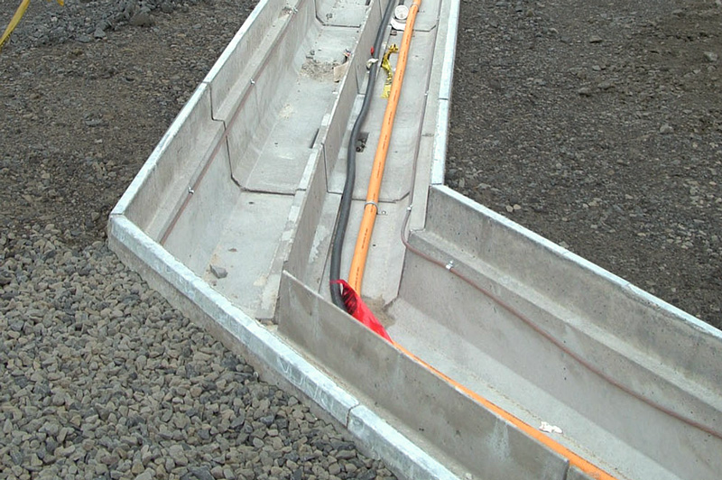 Cable partition or divider boards are used to separate Concast trench ...
