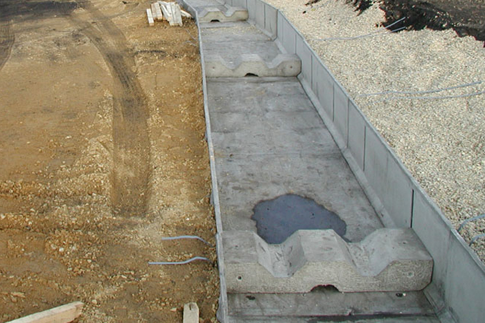 Concrete pipe support blocks support, stabilize, and separate internal ...